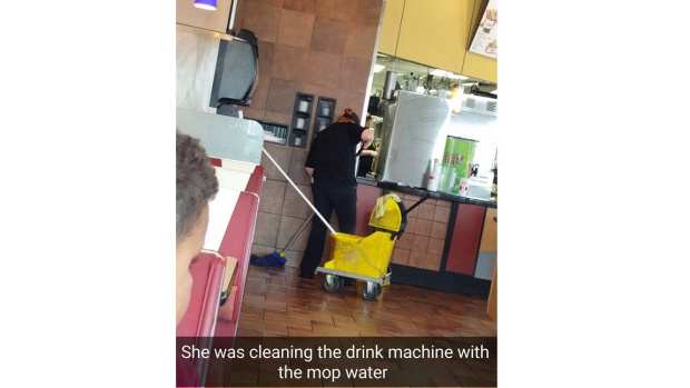taco bell employee cleans equipment with mop water - Opposing Views