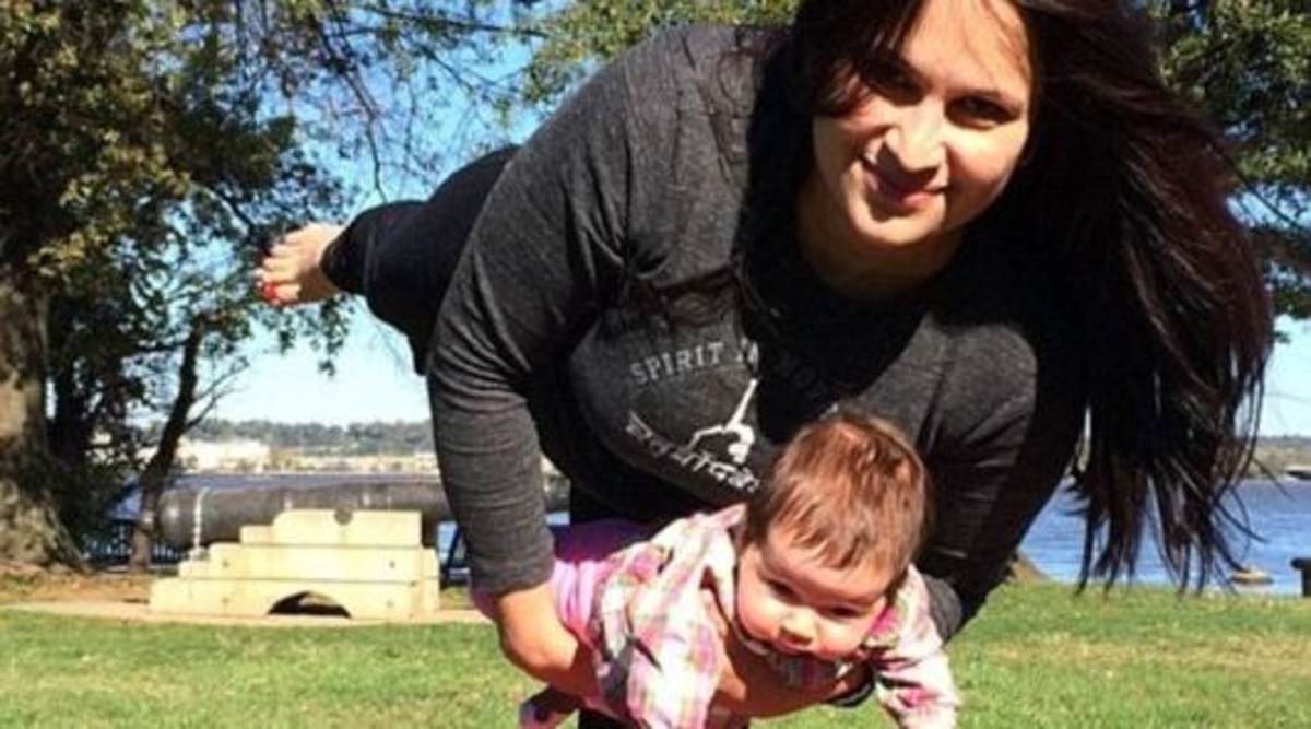 Mom Breastfeeds While Standing On Head Photos Opposing Views